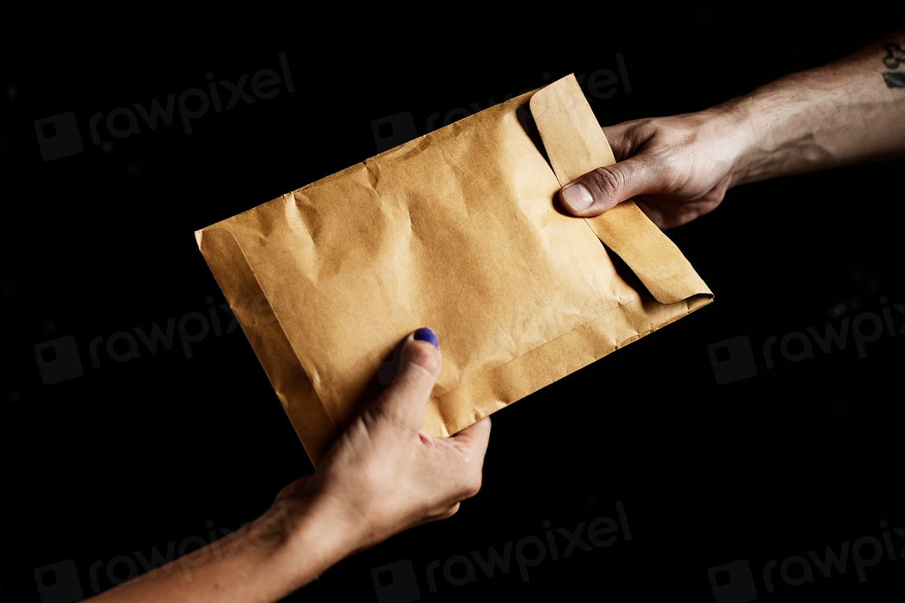 Handing out a brown envelope | Premium Photo - rawpixel
