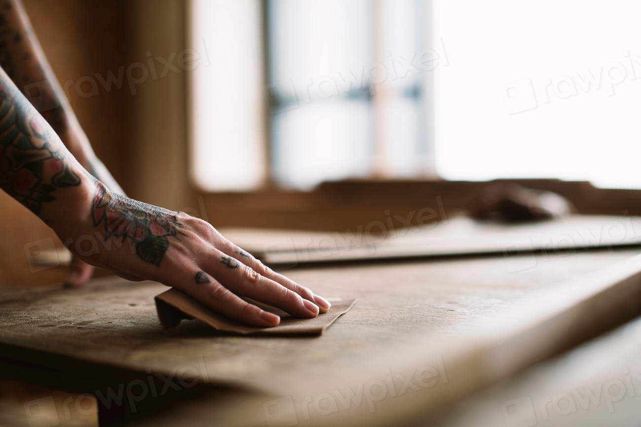 Hands with tattoo using sandpaper | Premium Photo - rawpixel