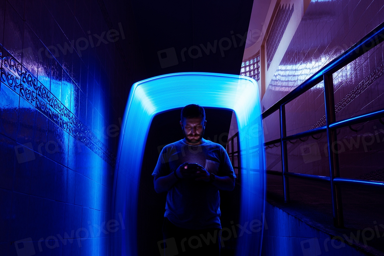 Man standing blue light long | Premium Photo - rawpixel