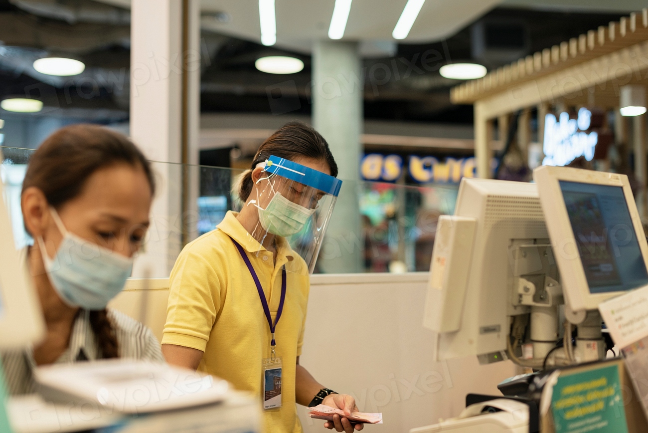 Cashiers in a supermarket during covid-19 | Free Photo - rawpixel