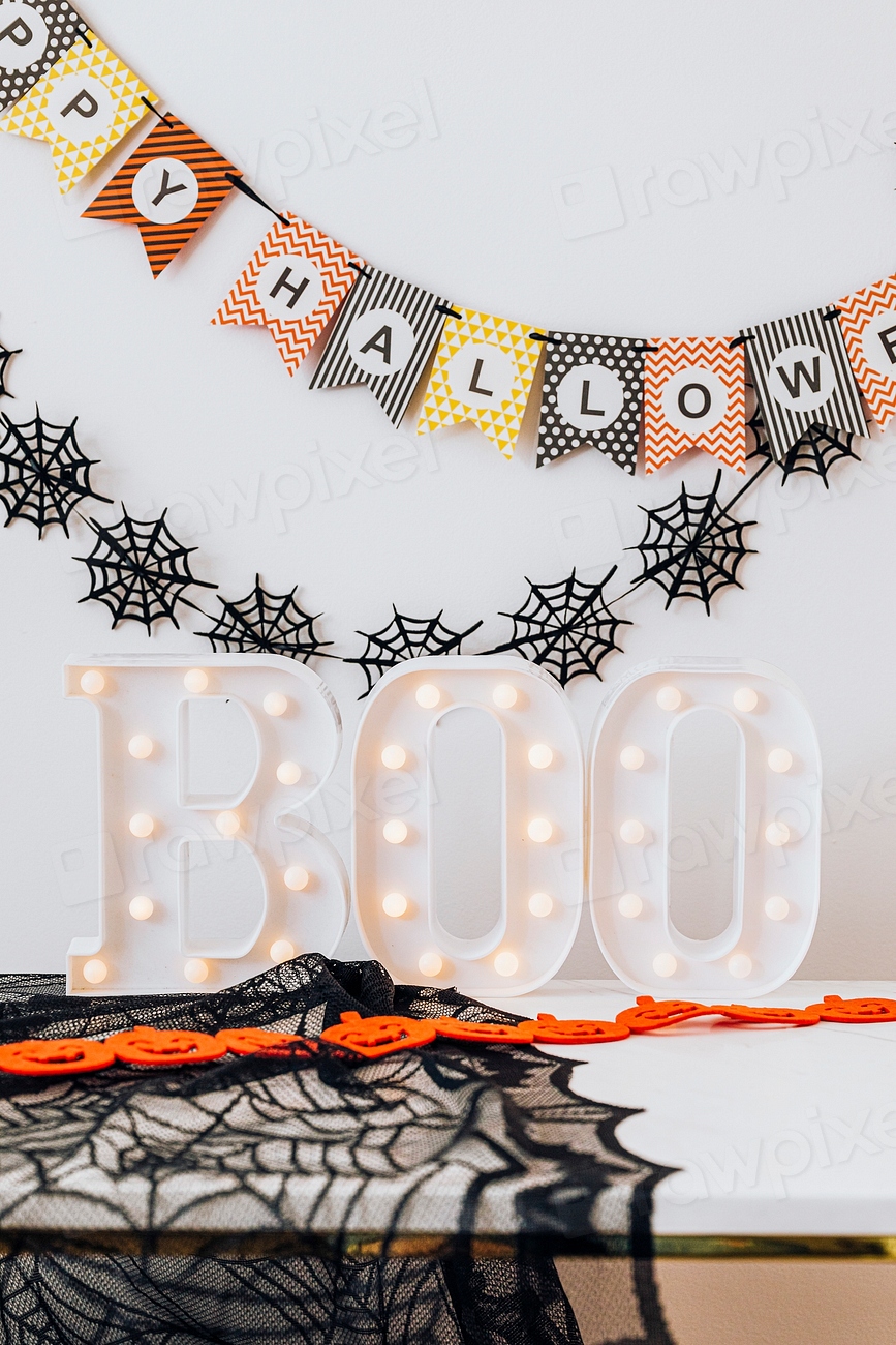 Lighted boo sign white table | Free Photo - rawpixel