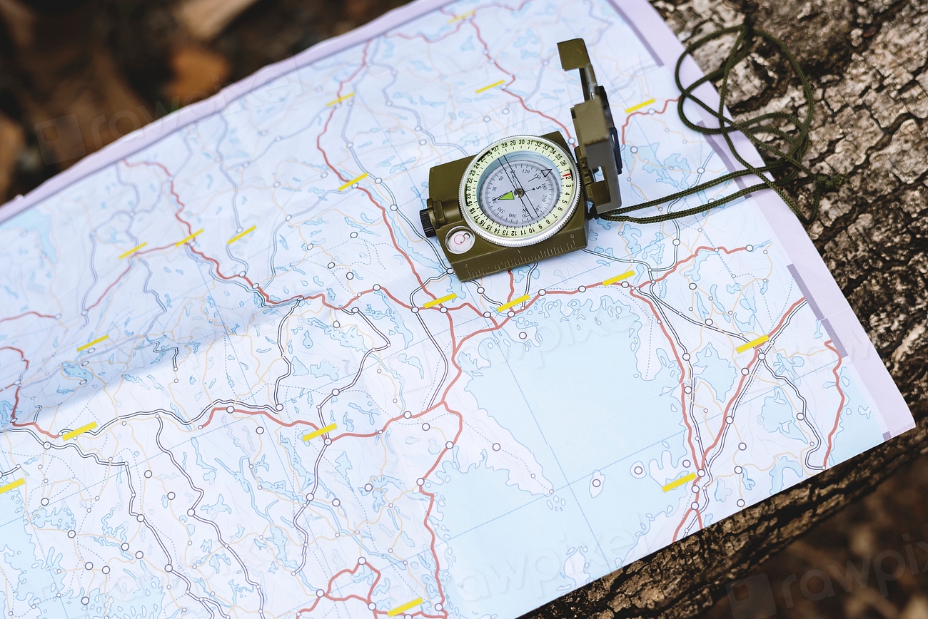 Map and compass tree trunk | Free Photo - rawpixel