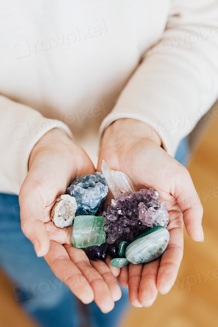 Woman hand full healing crystals | Premium Photo - rawpixel