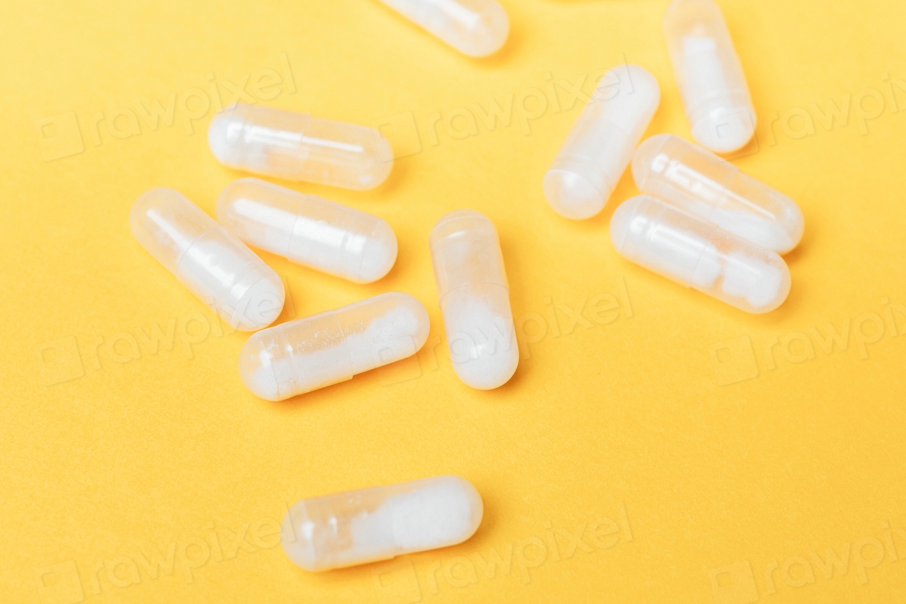 Pills and medication on a yellow | Free Photo - rawpixel