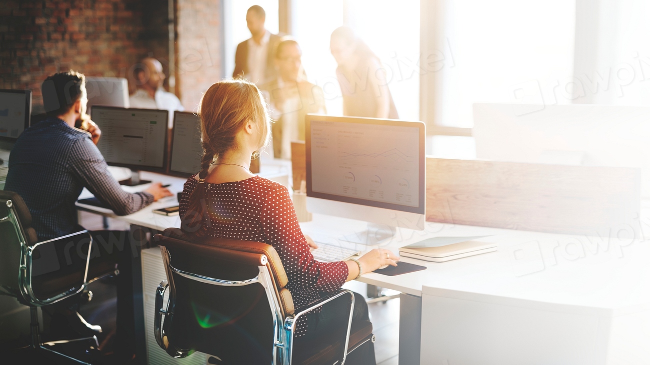 Employees working their desks office | Premium Photo - rawpixel