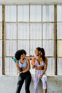 Sportive women talking gym while | Premium Photo - rawpixel