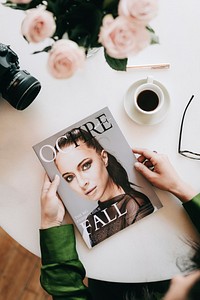 Woman reading a magazine in a cafe | Premium Photo - rawpixel