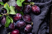 Closeup fresh plums tray. Visit | Free Photo - rawpixel