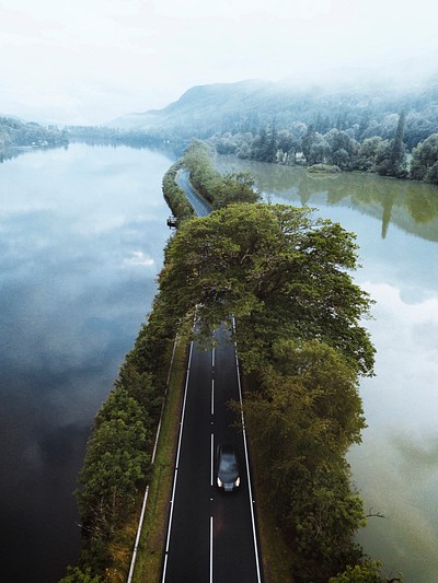 Driving along road lake drone | Premium Photo - rawpixel