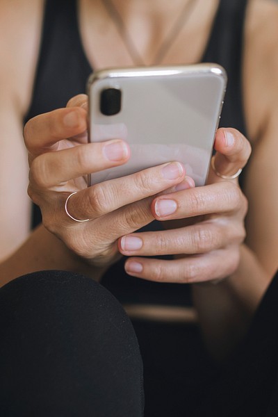 Woman using a mobile phone | Free Photo - rawpixel