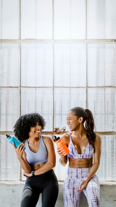 Sportive women talking gym while | Premium Photo - rawpixel