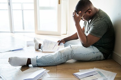 Man managing the debt | Premium Photo - rawpixel