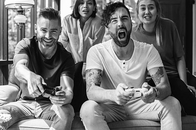 Friends enjoying video game together | Free Photo - rawpixel
