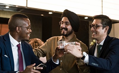 Business people drinking alcohol work | Premium Photo - rawpixel