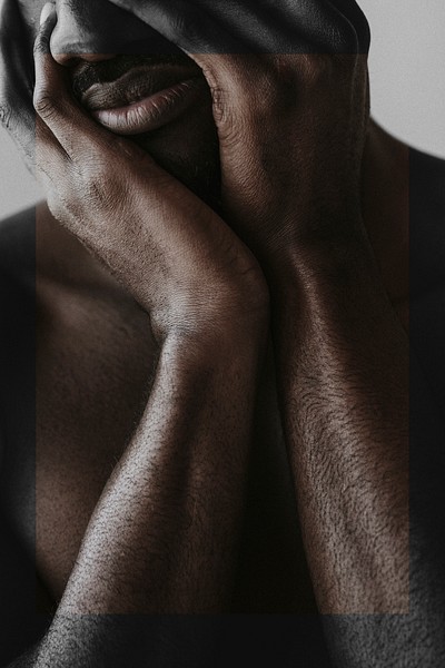 Stressed black man covering his | Premium Photo - rawpixel