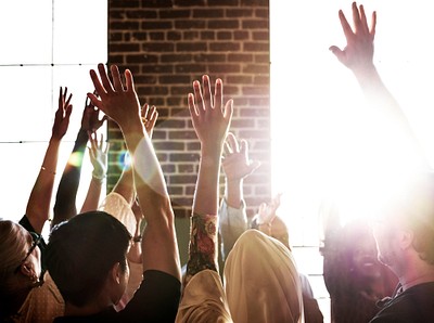 People raising their hands seminar | Premium Photo - rawpixel