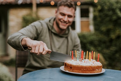 Man slicing piece cake birthday | Free Photo - rawpixel