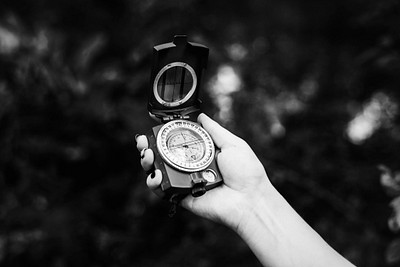 Man checking direction compass | Premium Photo - rawpixel