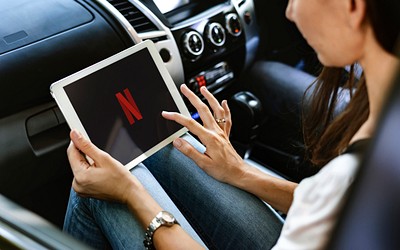 Woman watching Netflix on a digital | Free Photo - rawpixel