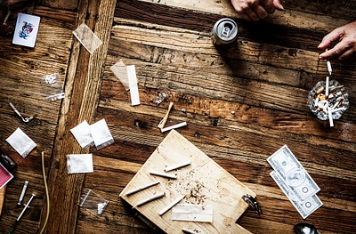 Rolling cigarettes on the table | Premium Photo - rawpixel