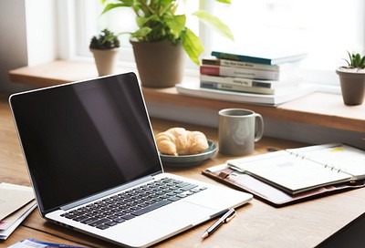 Laptop on a dinner table | Premium Photo - rawpixel