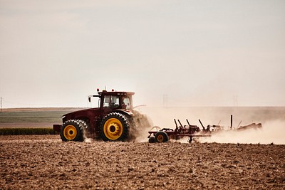 A farmer kicks up dust | Free Photo - rawpixel