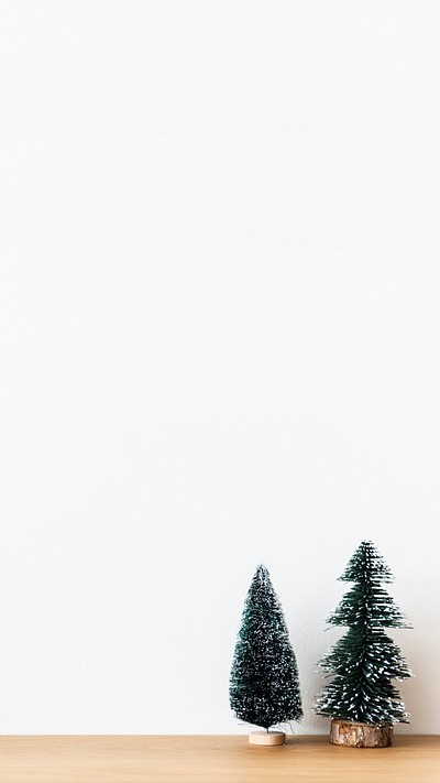 Mini Christmas trees phone wallpaper | Premium Photo - rawpixel