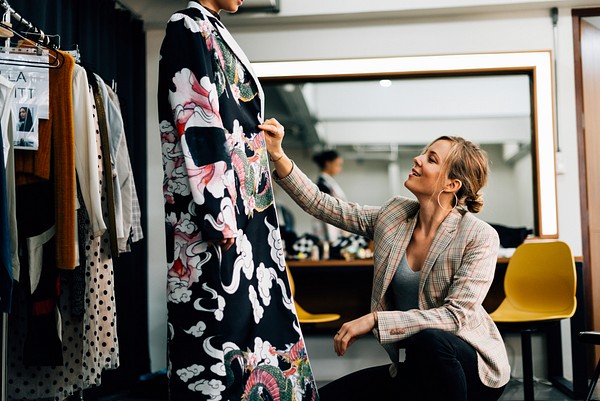 Stylist dressing up a model | Premium Photo - rawpixel