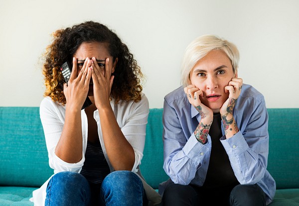 Two scared girls couch | Premium Photo - rawpixel