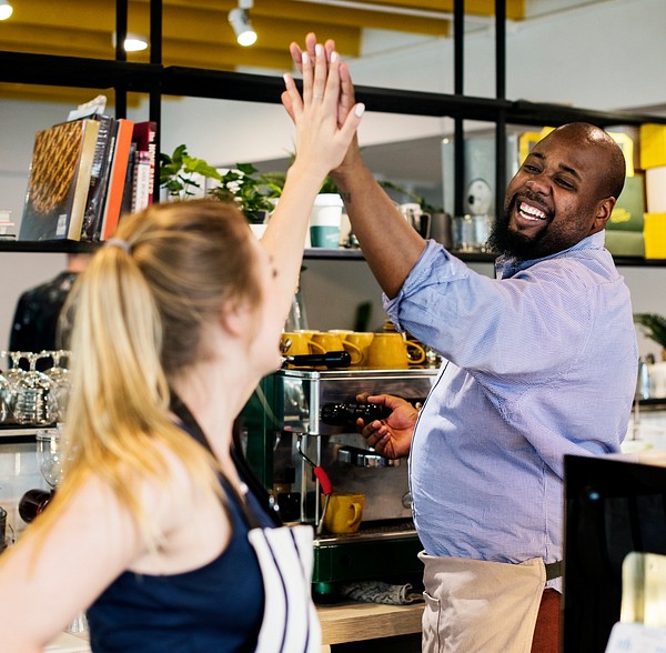Colleagues give high five each | Premium Photo - rawpixel