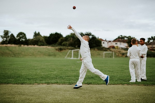 Cricket player catching a ball | Premium Photo - rawpixel