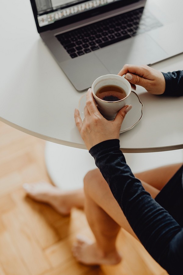 Woman cup tea and laptop | Premium Photo - rawpixel