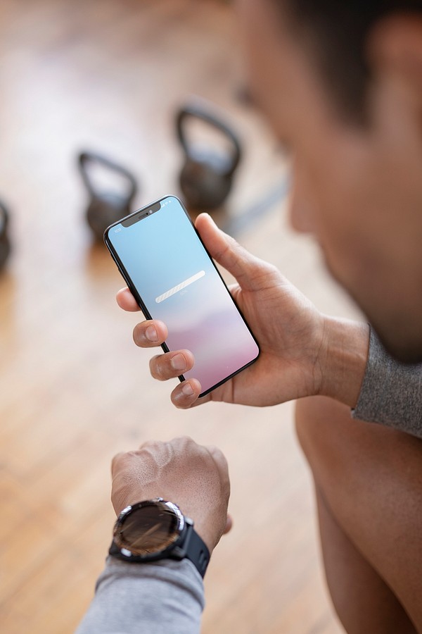 Coach using mobile phone and | Premium Photo - rawpixel