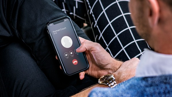 Closeup businessman using mobile phone | Premium Photo - rawpixel