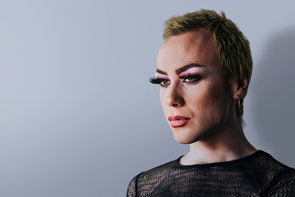 Blond non-binary person wearing makeup | Premium Photo - rawpixel