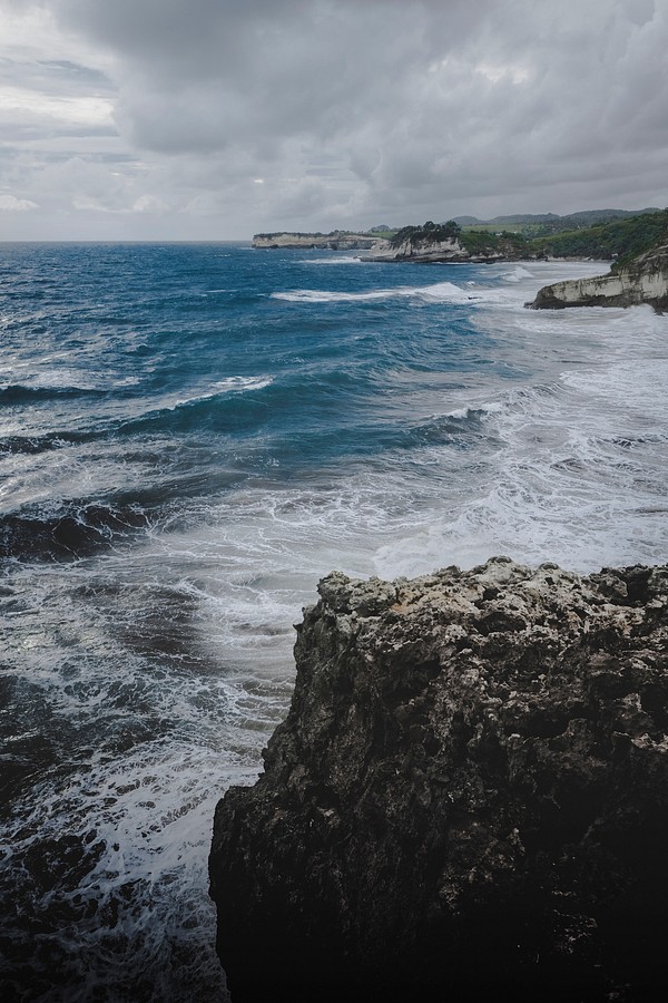 Waves hitting the cliffs in Bali, | Free Photo - rawpixel
