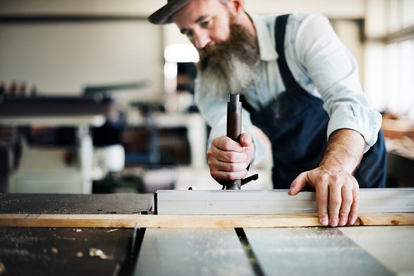 Craftsman working wood shop | Premium Photo - rawpixel