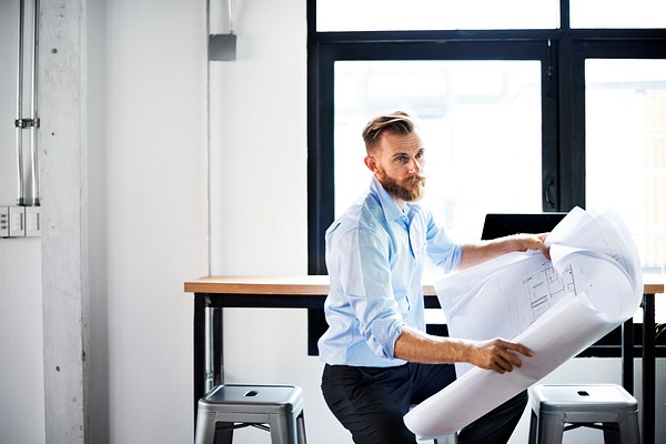 An architect in his studio | Premium Photo - rawpixel