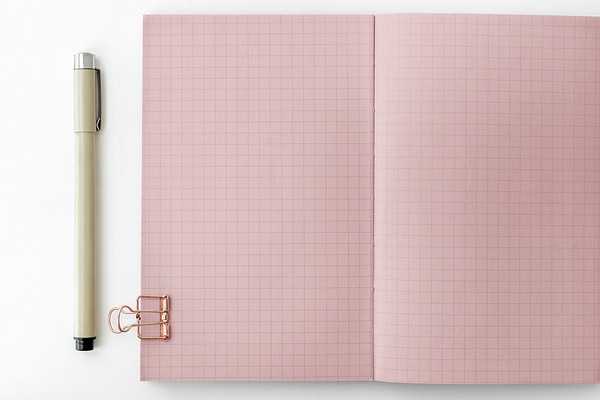 Pink grid patterned notebook page | Premium PSD Mockup - rawpixel