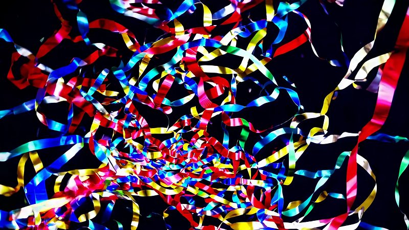 Colorful ribbons cascade above, captured | Free Video - rawpixel