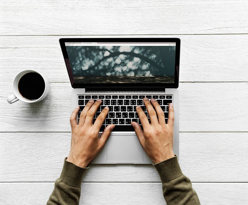 Aerial view man using computer | Premium PSD Mockup - rawpixel