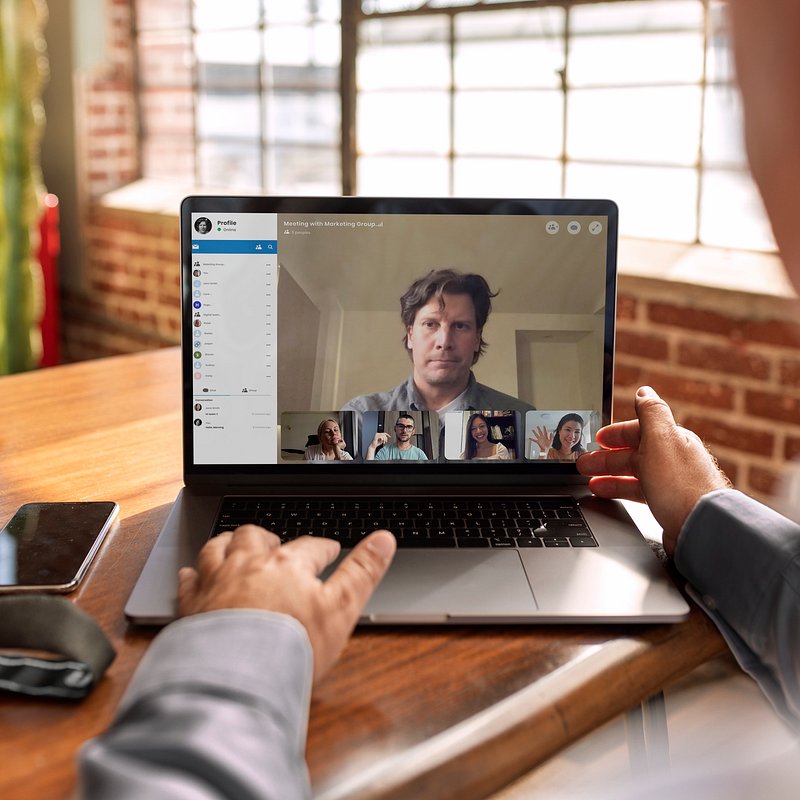 Colleagues having a video conference | Free PSD Mockup - rawpixel