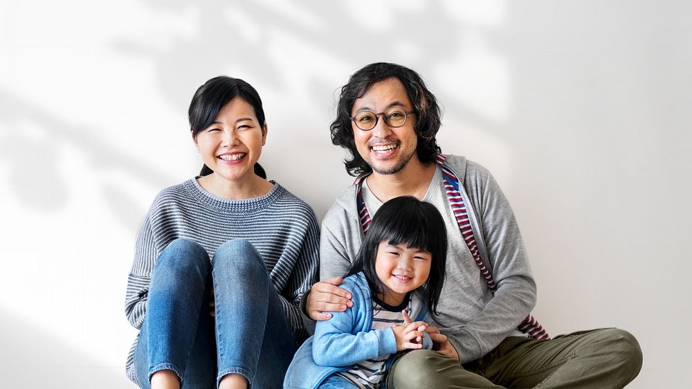 Happy Japanese family sitting floor | Premium Editable Design - rawpixel