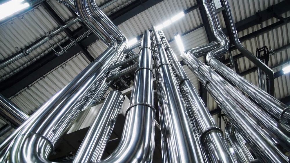 Low-angle shot industrial pipes reflecting | Free Video - rawpixel