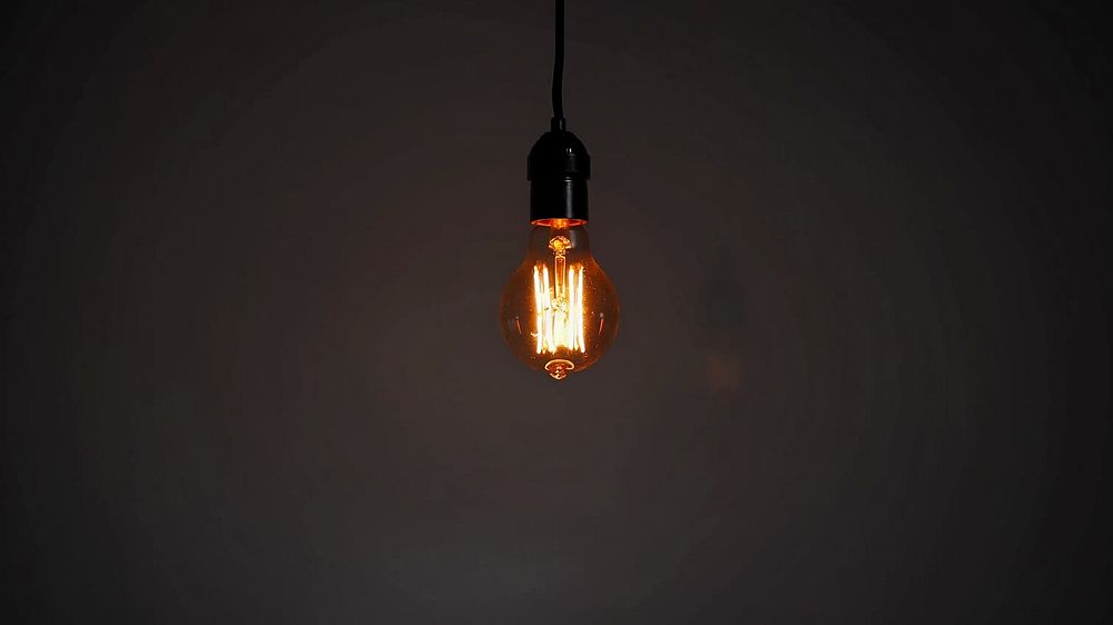 dimly lit vintage bulb hanging | Free Video - rawpixel