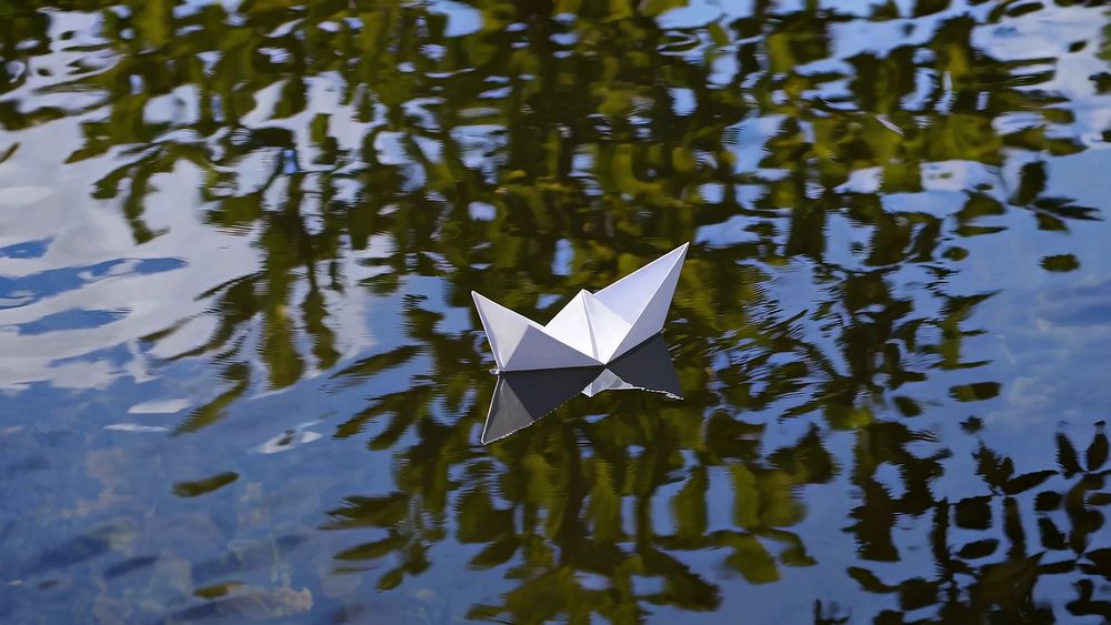 Aerial view paper boat floating | Free Video - rawpixel