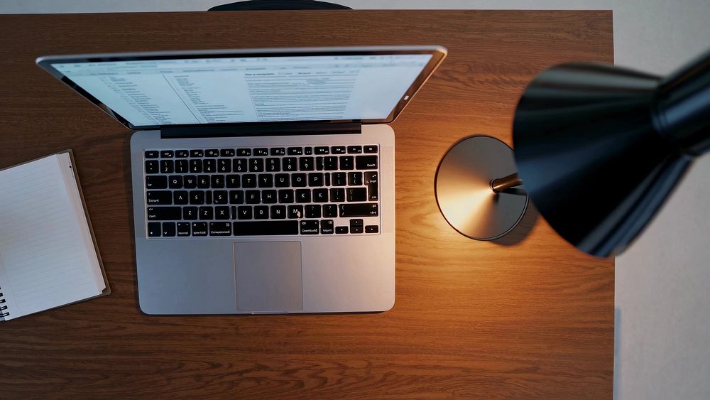 Top-down view laptop wooden desk | Free Video - rawpixel