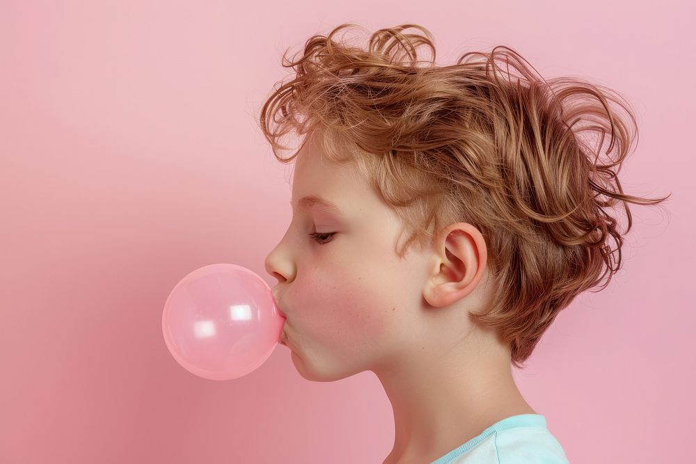 Kid blowing bubble gum balloon | Premium Photo - rawpixel