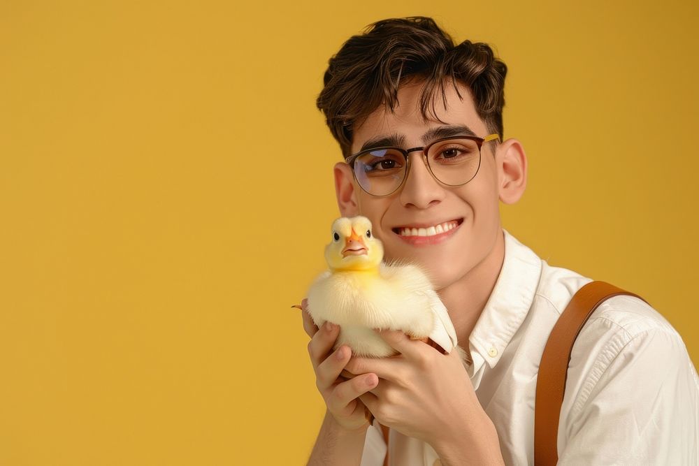 Hispanic man hug duck portrait | Free Photo - rawpixel