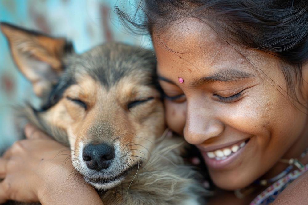 Indian woman hugging dog photo | Free Photo - rawpixel